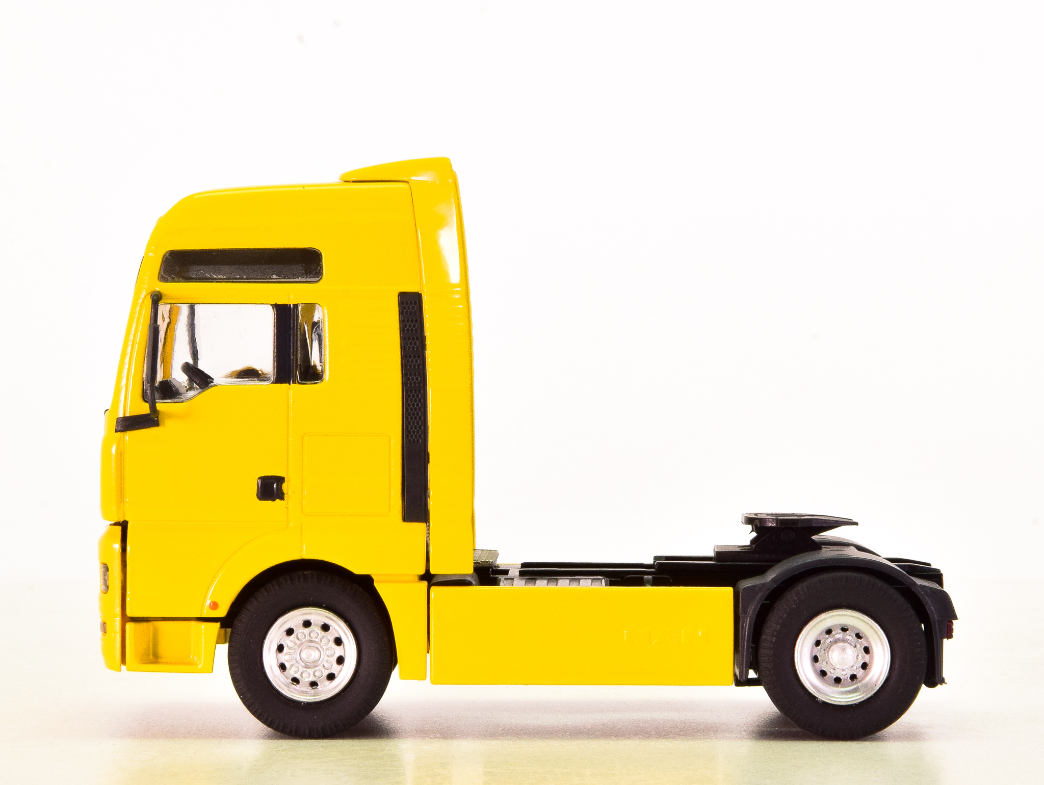 OXID eShop 6 | Conrad 09.38069-0168 (1:50) – MAN Zugmaschine TG 460 A XXL, gelb | purchase online